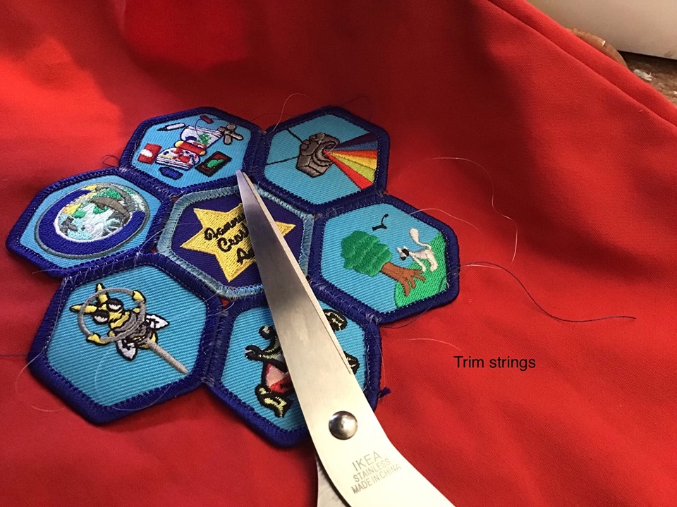 How to sew on merit badges